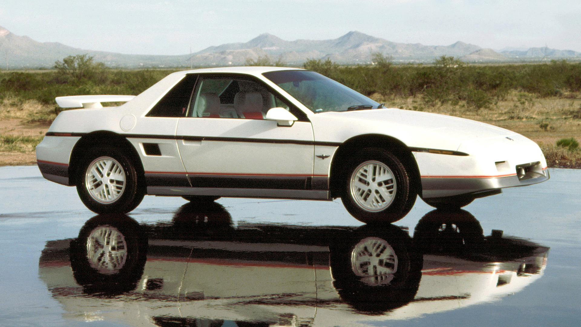 1980’s SHOWDOWN: Pontiac Fiero vs Toyota MR2 | SpeedwayMedia.com